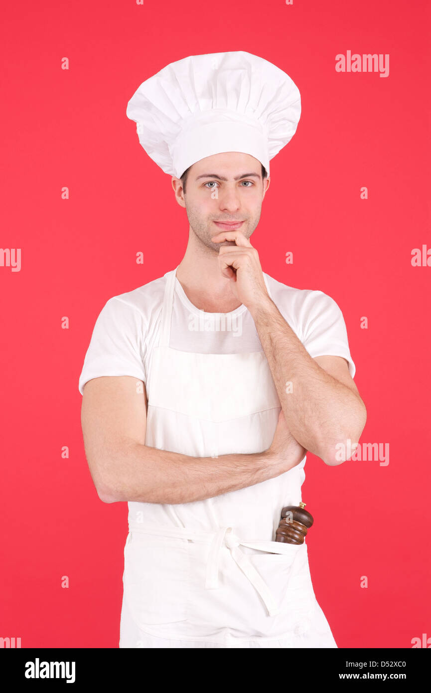 chef shot in red background Stock Photo - Alamy