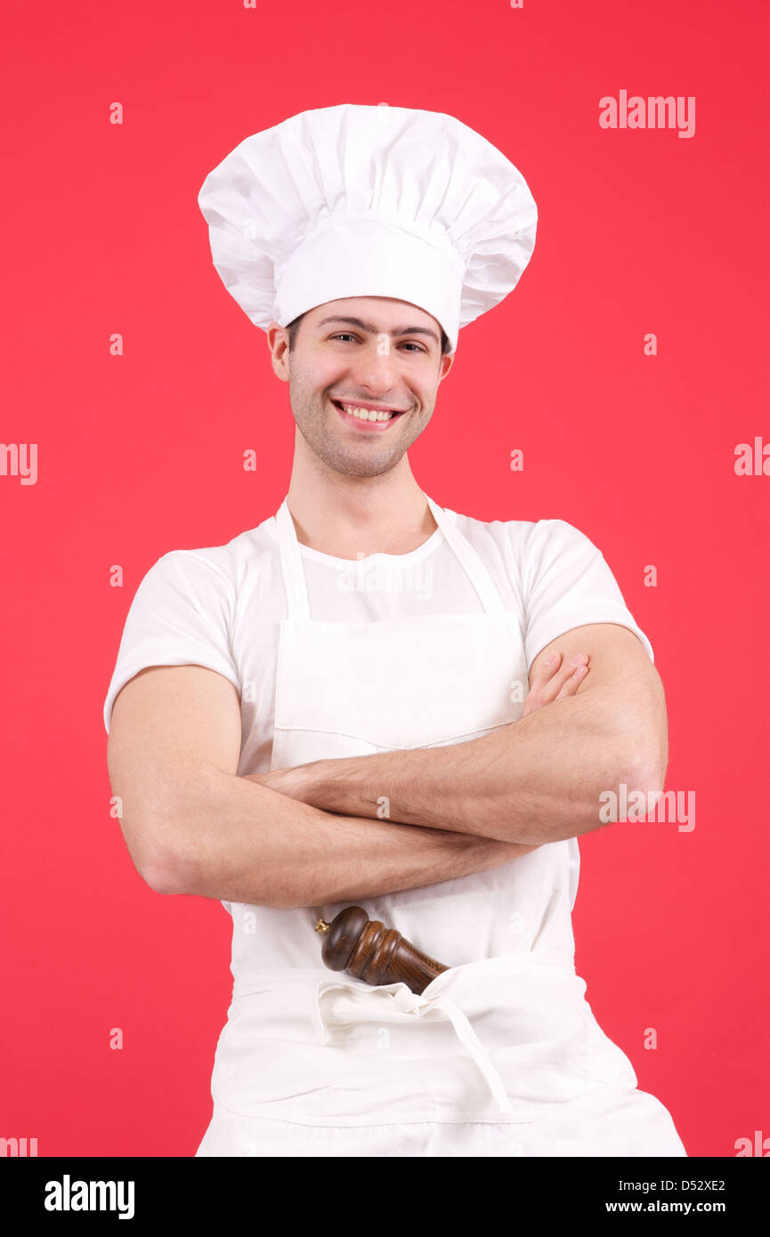 chef shot in red background Stock Photo - Alamy