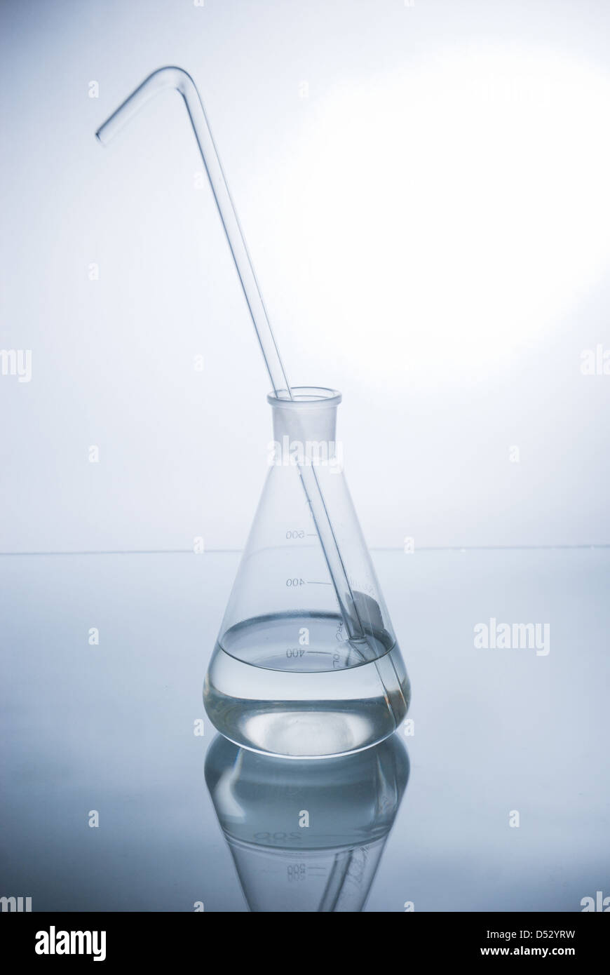 Laboratory glassware over white background Stock Photo - Alamy