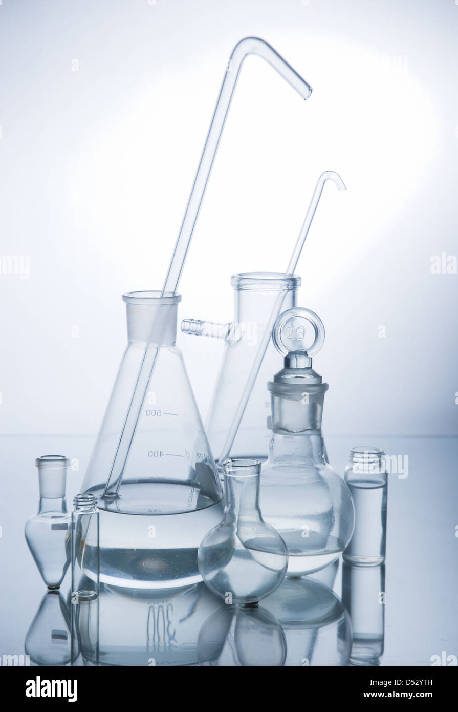 Laboratory glassware over white background Stock Photo - Alamy