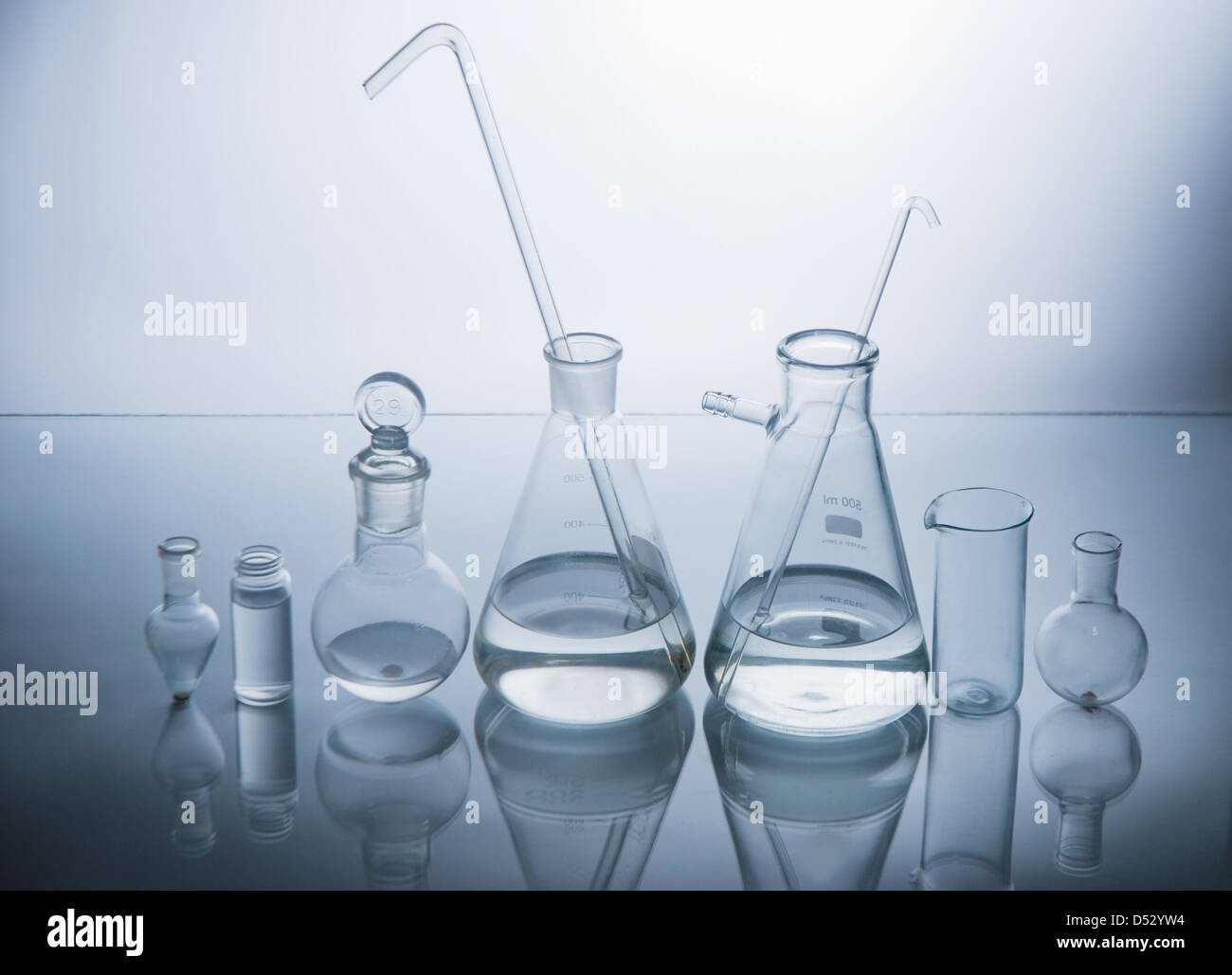 Laboratory glassware over white background Stock Photo - Alamy