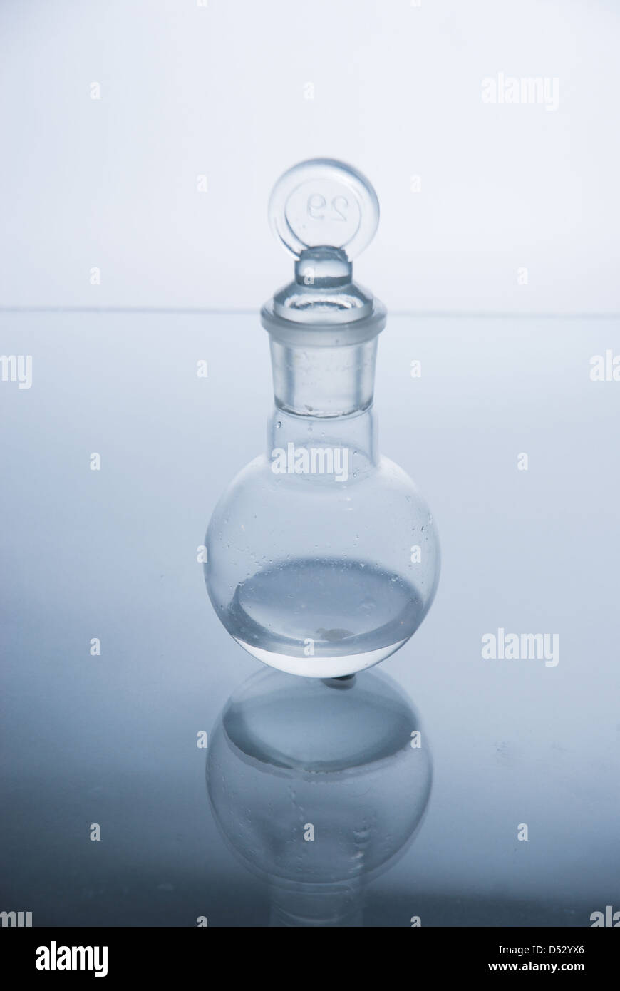 Laboratory glassware over white background Stock Photo - Alamy