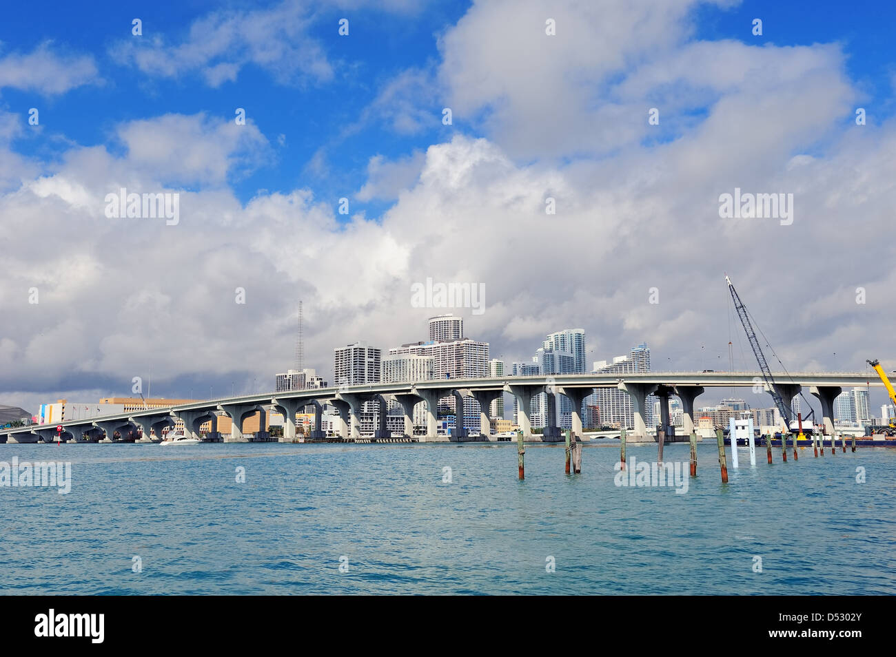 Miami skyscrapers with bridge over sea in the day Stock Photo - Alamy