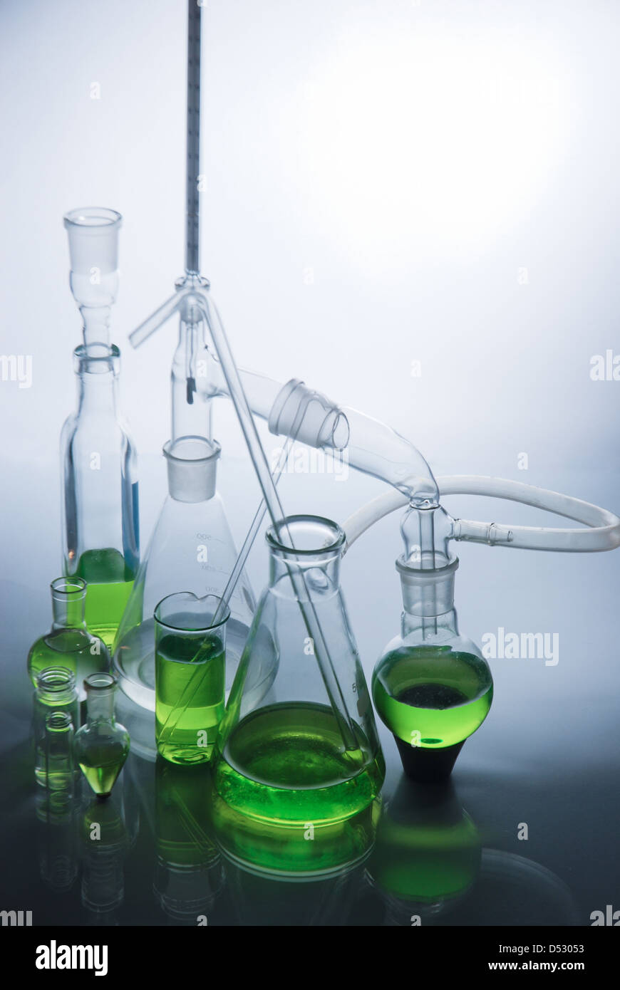 Laboratory glassware over white background Stock Photo - Alamy