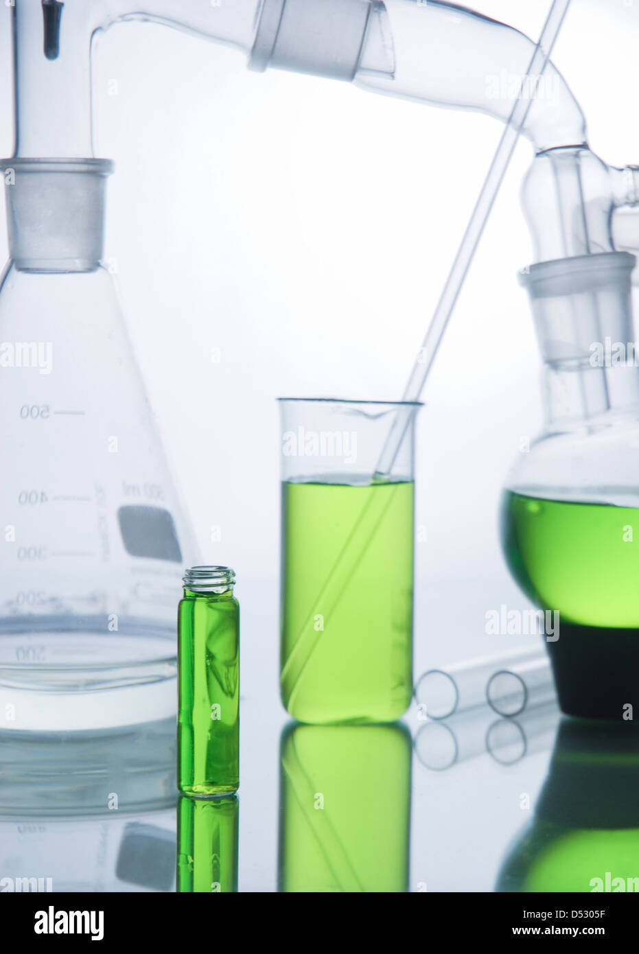 Laboratory glassware over white background Stock Photo - Alamy