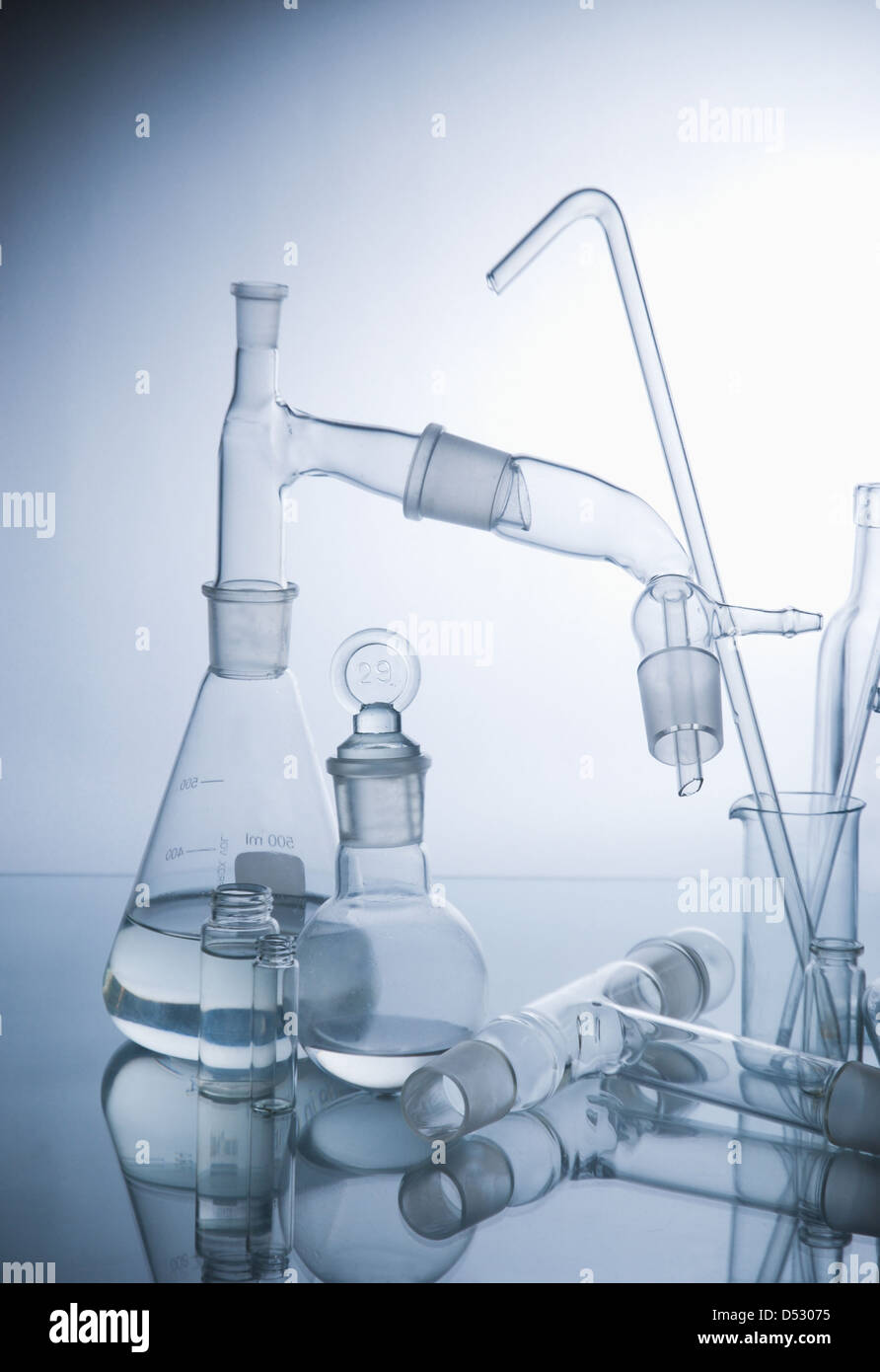 Laboratory glassware over white background Stock Photo - Alamy