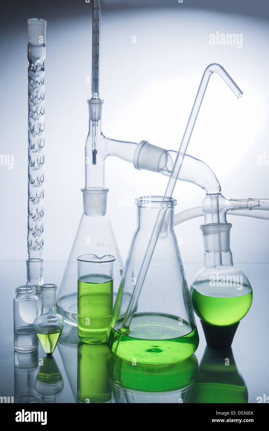 Laboratory glassware over white background Stock Photo - Alamy