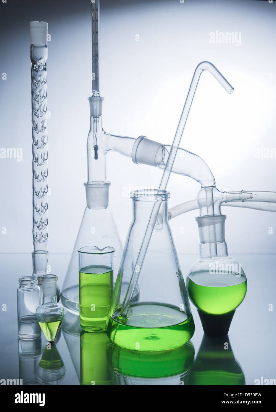 Laboratory glassware over white background Stock Photo - Alamy