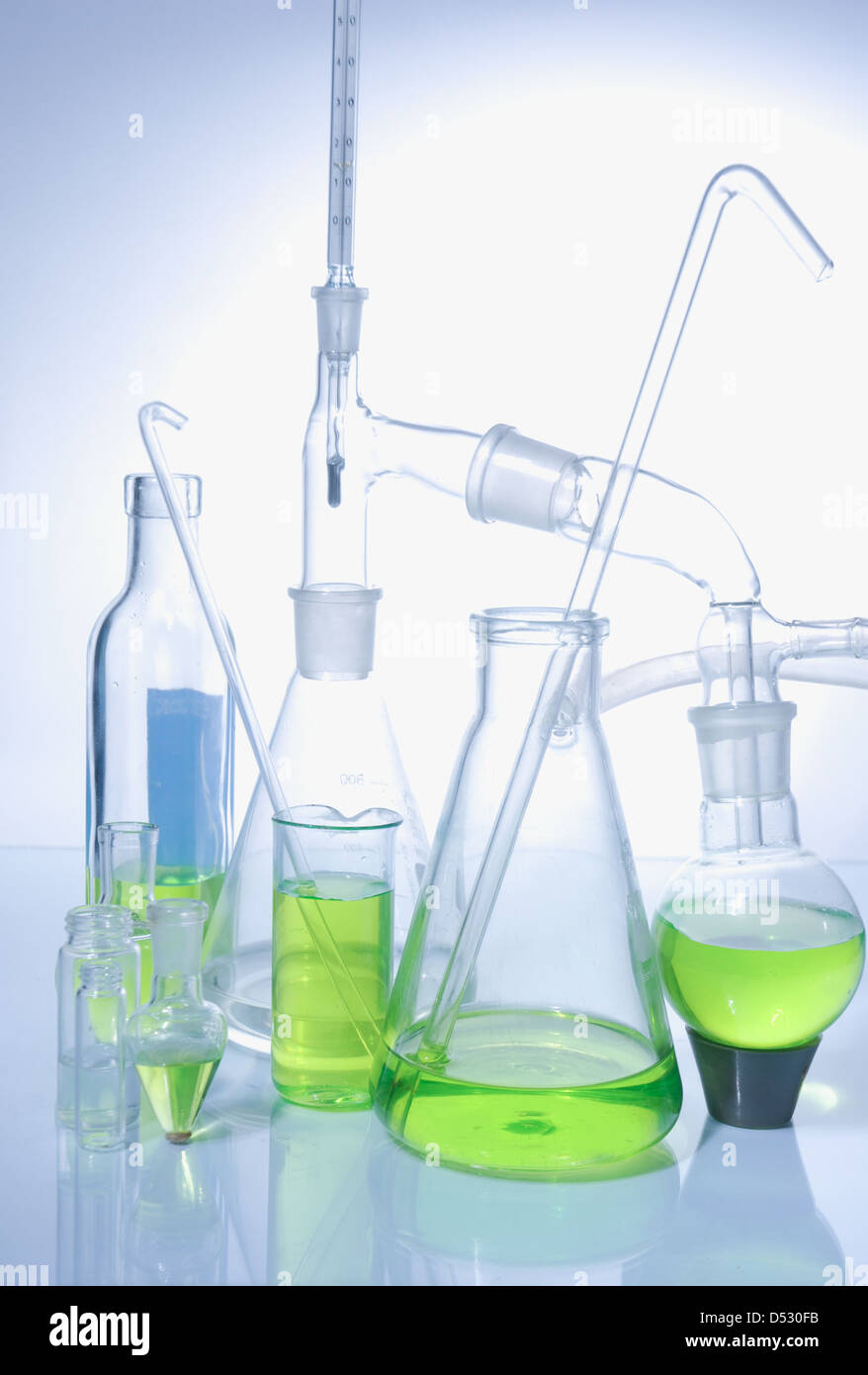Laboratory glassware over white background Stock Photo - Alamy