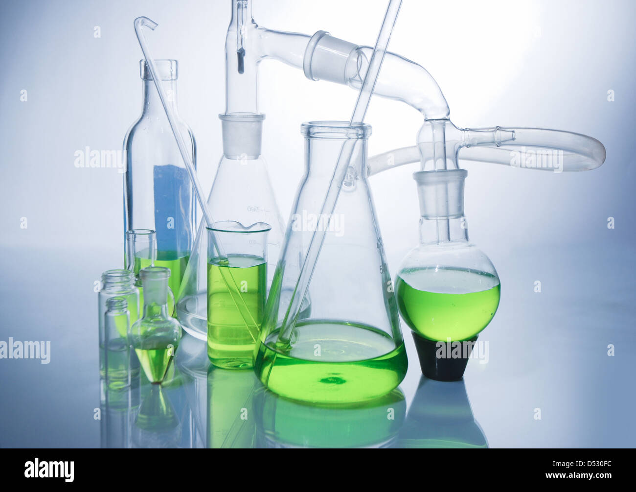 Laboratory glassware over white background Stock Photo - Alamy