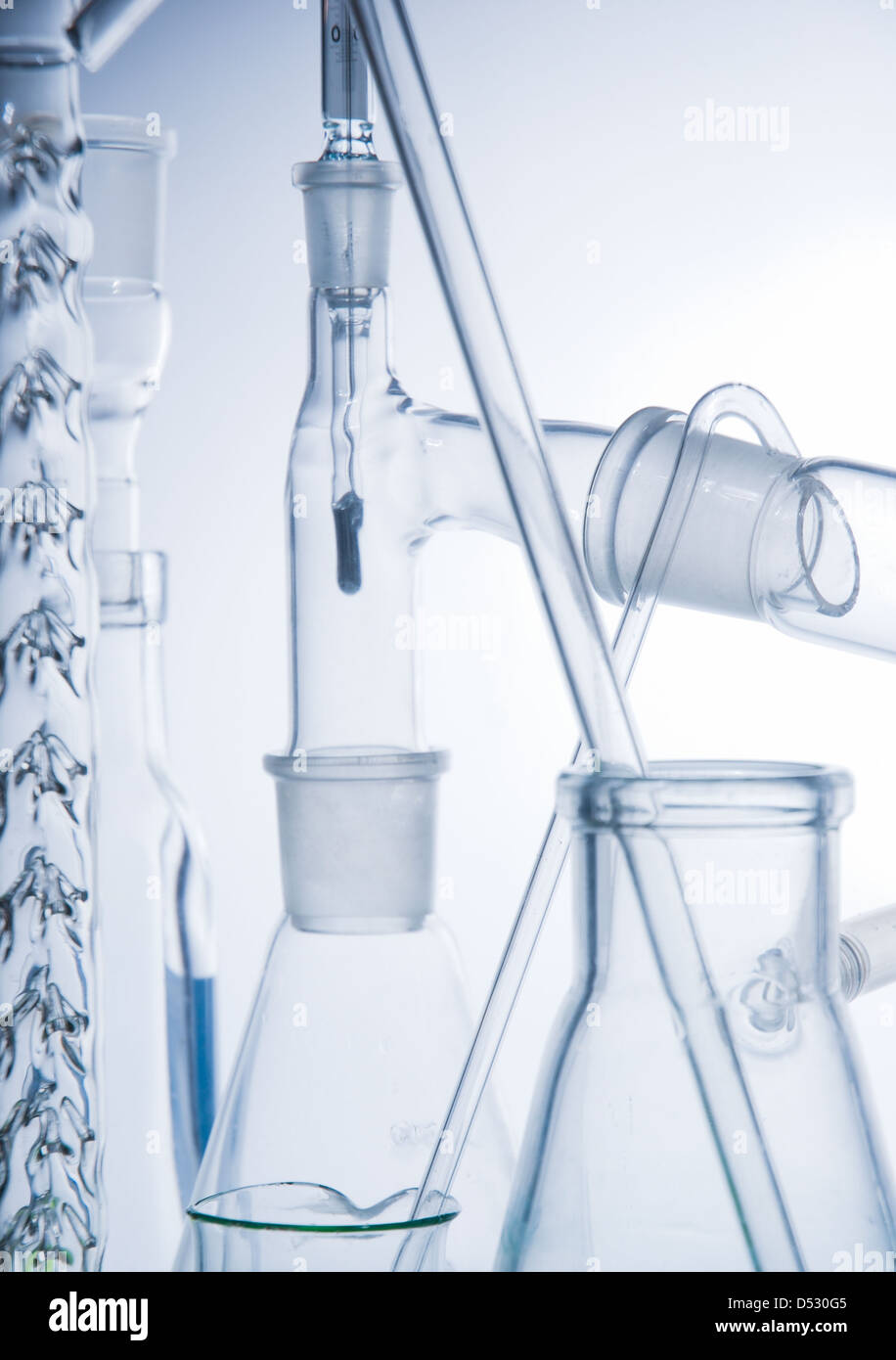 Laboratory glassware over white background Stock Photo - Alamy