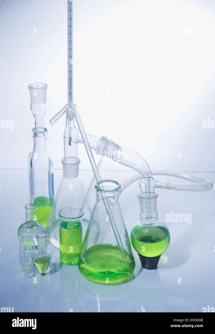 Laboratory glassware over white background Stock Photo - Alamy