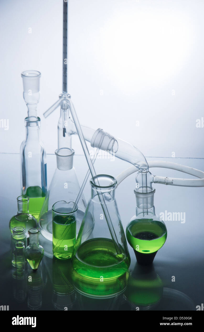 Laboratory glassware over white background Stock Photo - Alamy