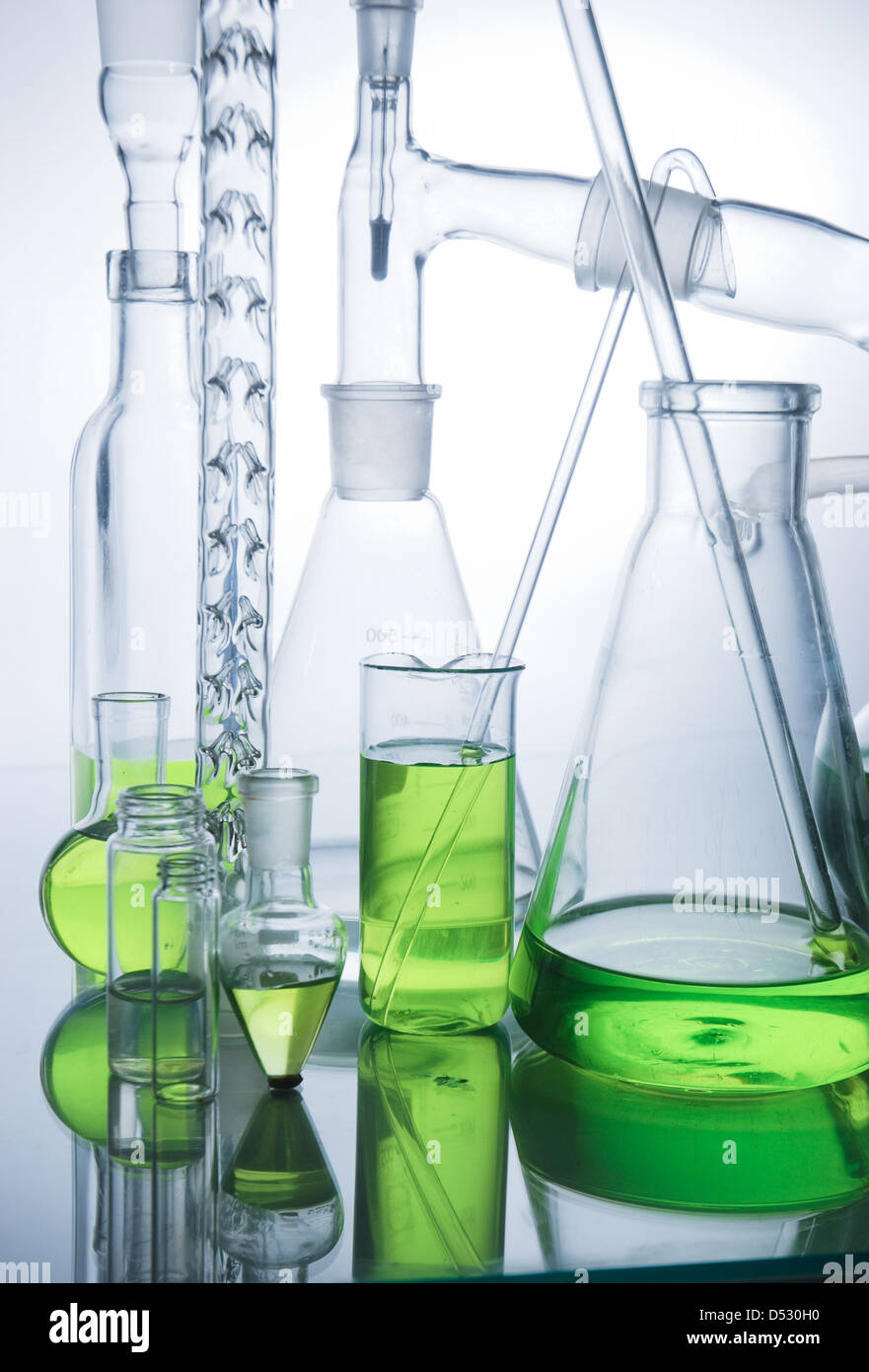 Laboratory glassware over white background Stock Photo - Alamy