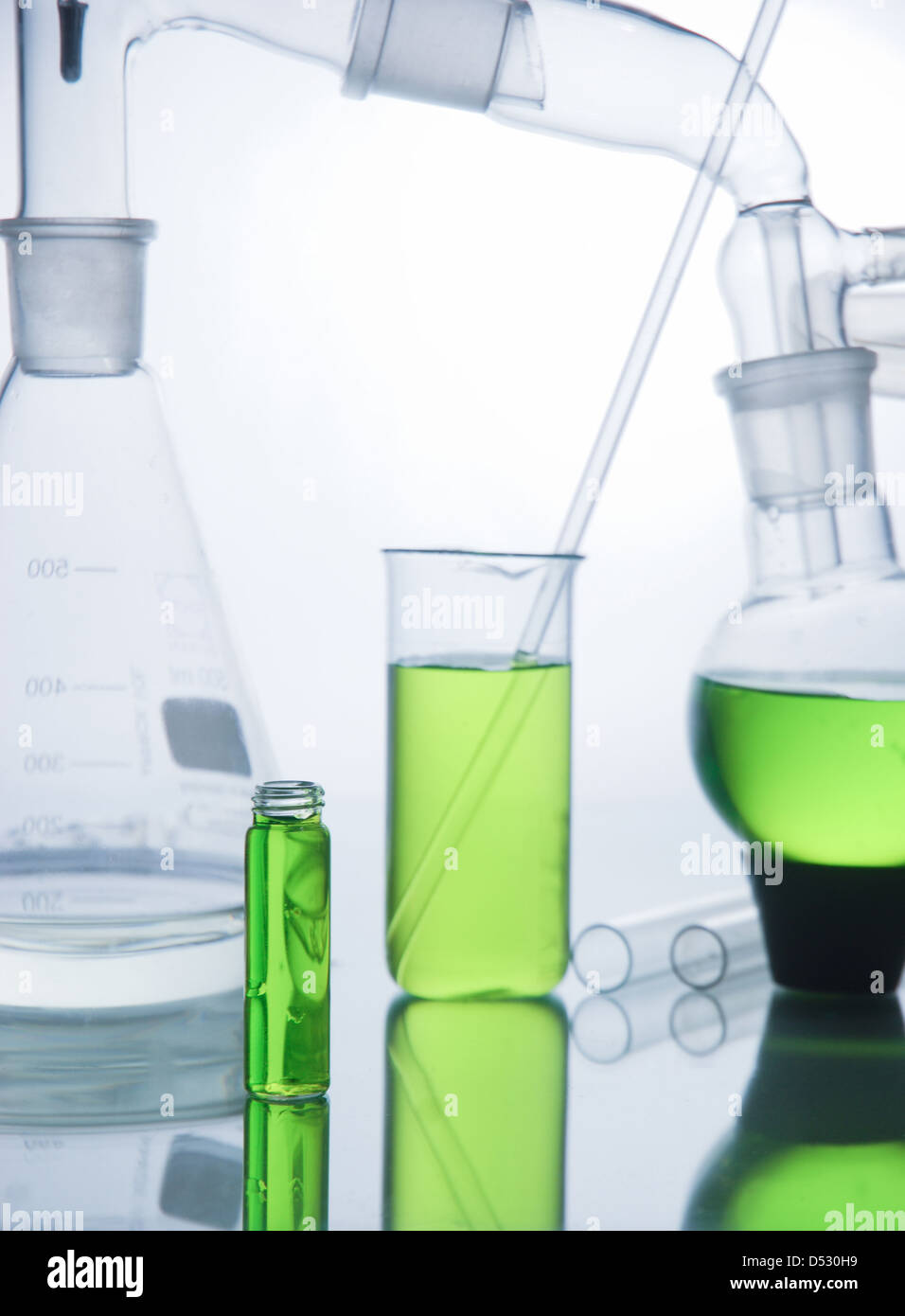 Laboratory glassware over white background Stock Photo - Alamy