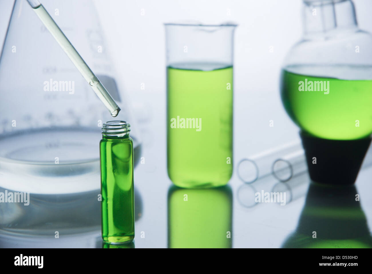 Laboratory glassware over white background Stock Photo - Alamy