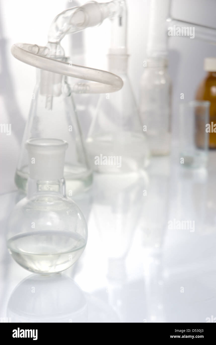 Laboratory glassware over white background Stock Photo - Alamy