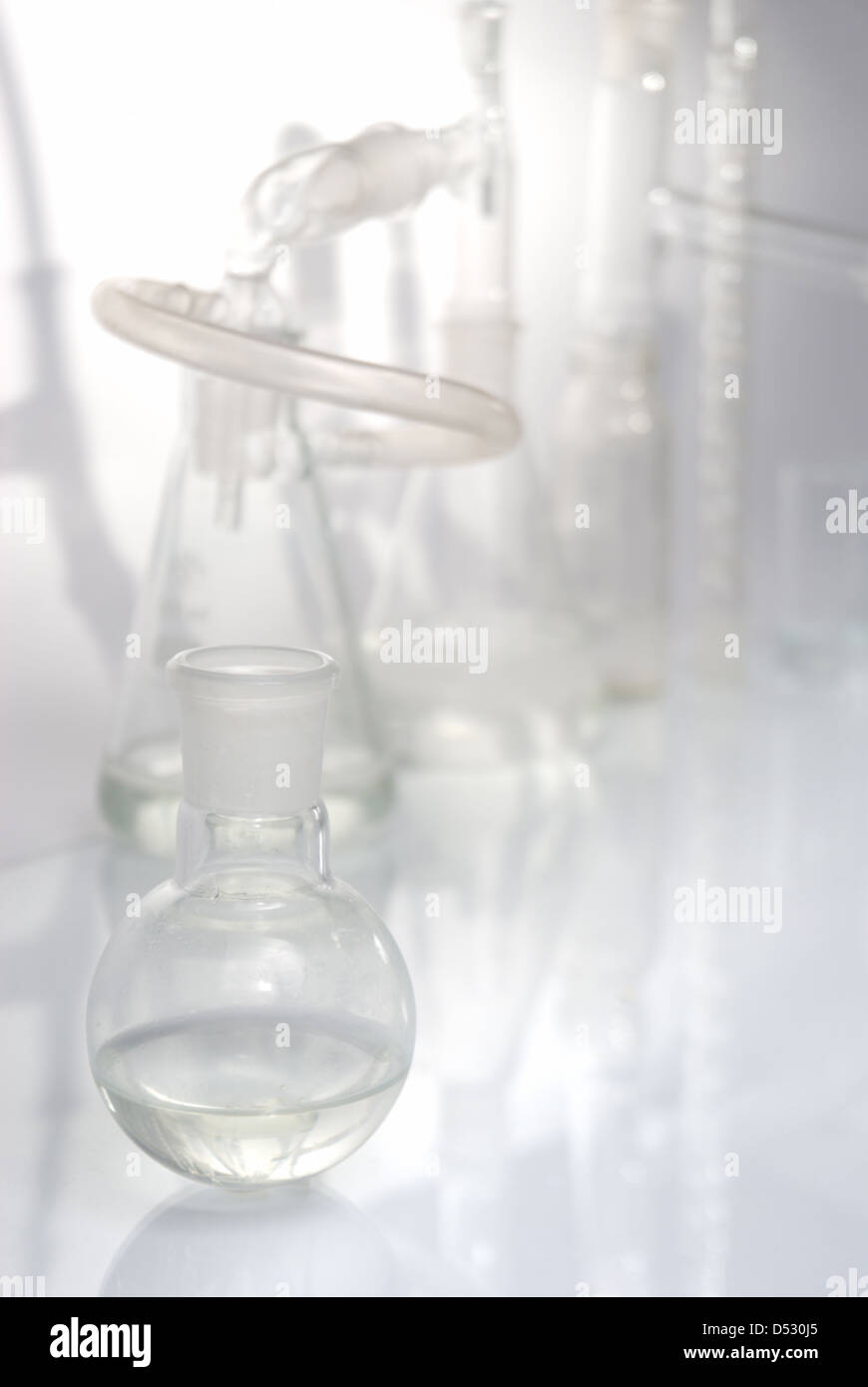 Laboratory glassware over white background Stock Photo - Alamy