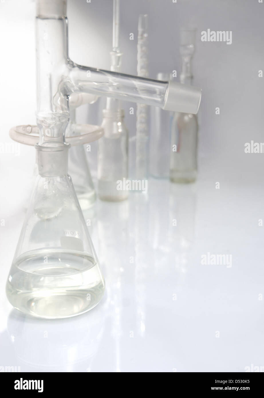 Laboratory glassware over white background Stock Photo - Alamy