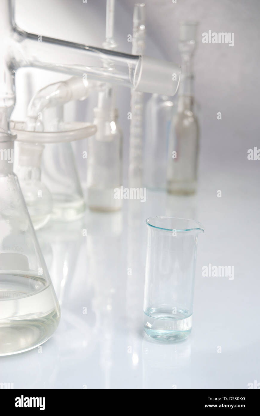 Laboratory glassware over white background Stock Photo - Alamy