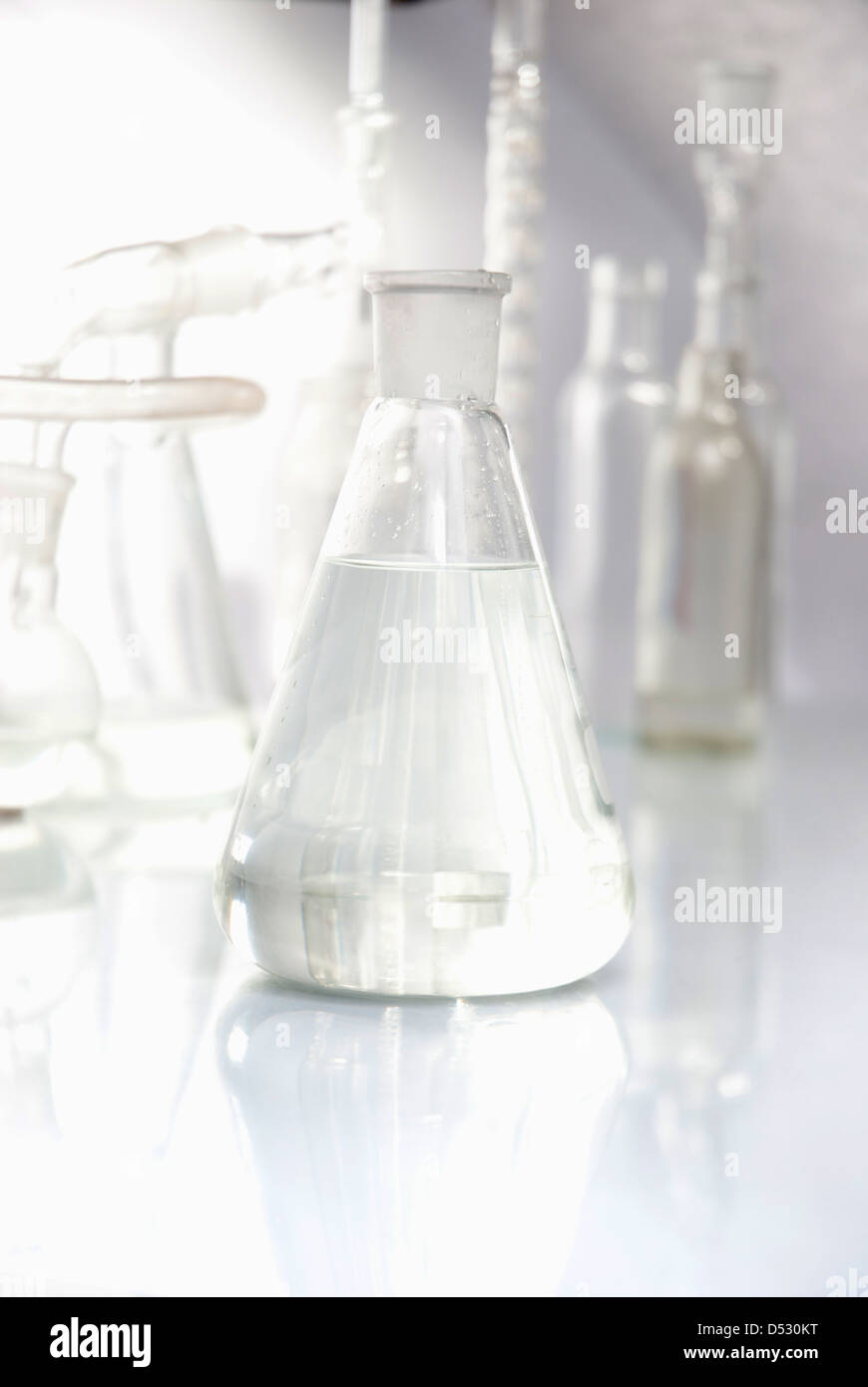Laboratory glassware over white background Stock Photo - Alamy