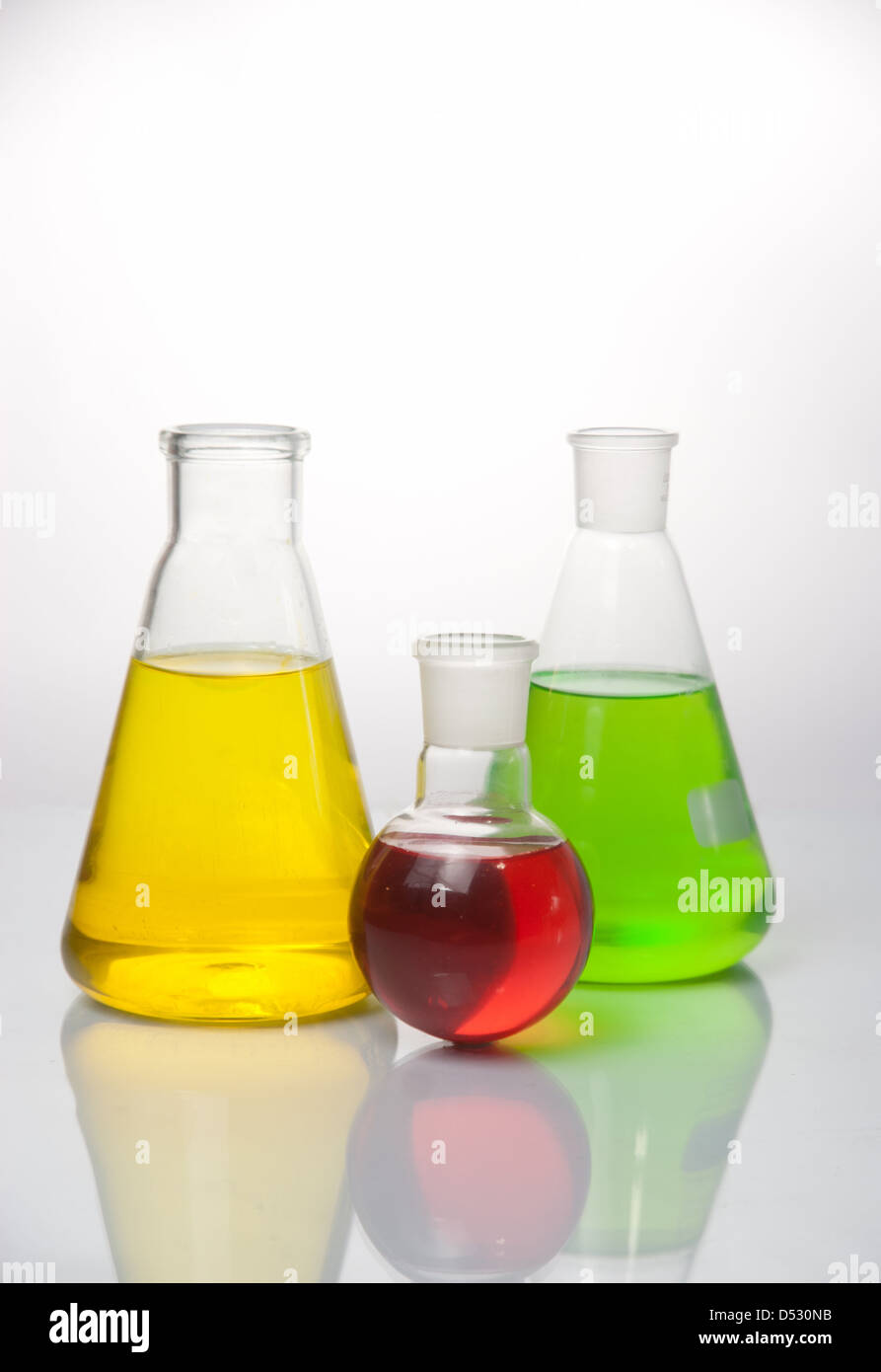 Laboratory glassware over white background Stock Photo - Alamy