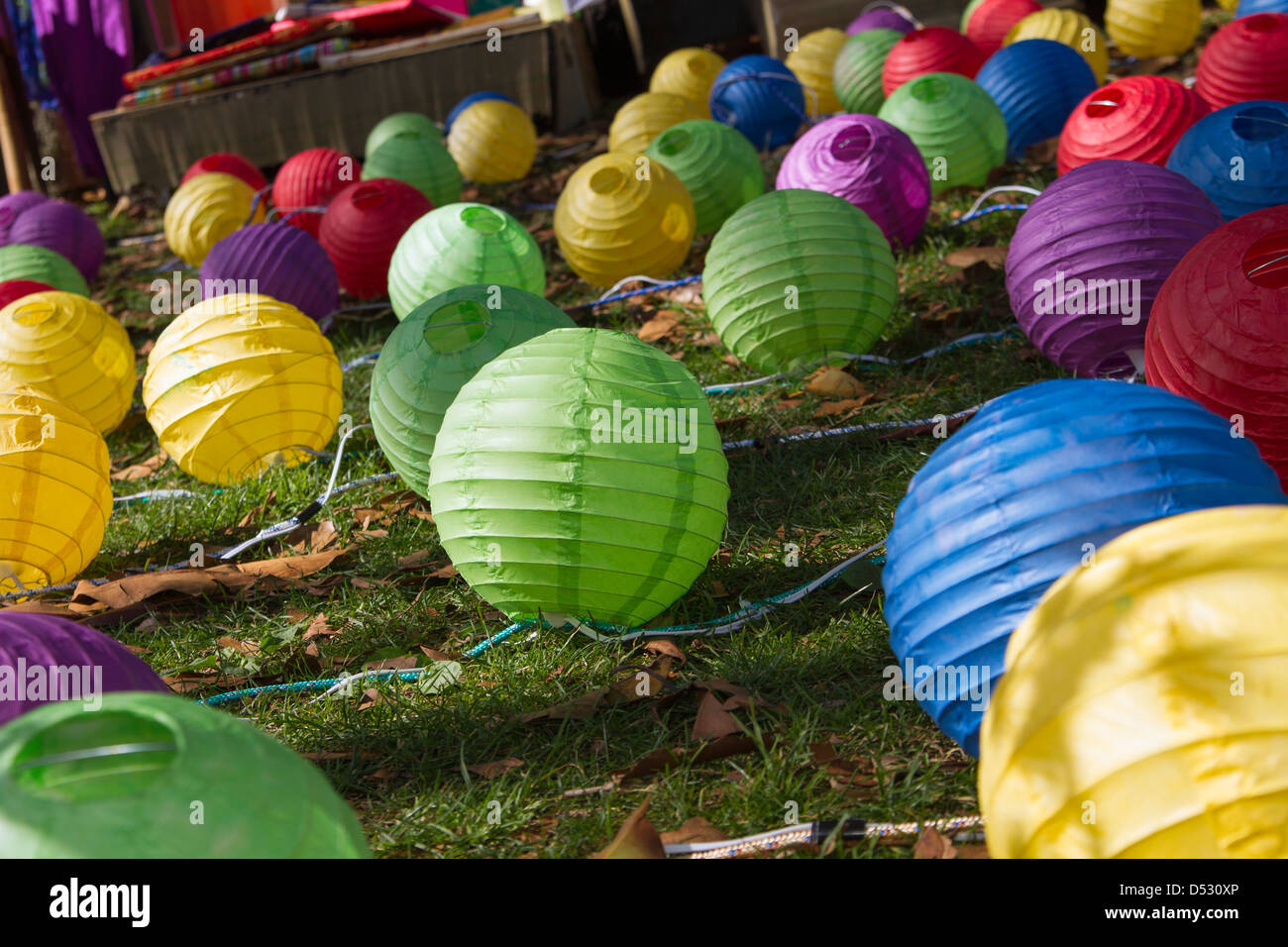 Paper lanterns strung together waiting to be hung Stock Photo - Alamy