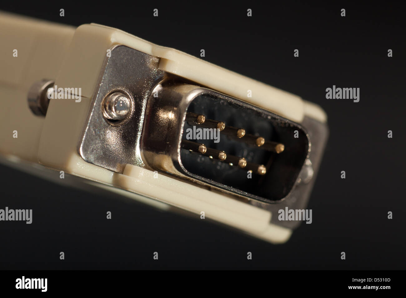 Computer plug on black background Stock Photo - Alamy
