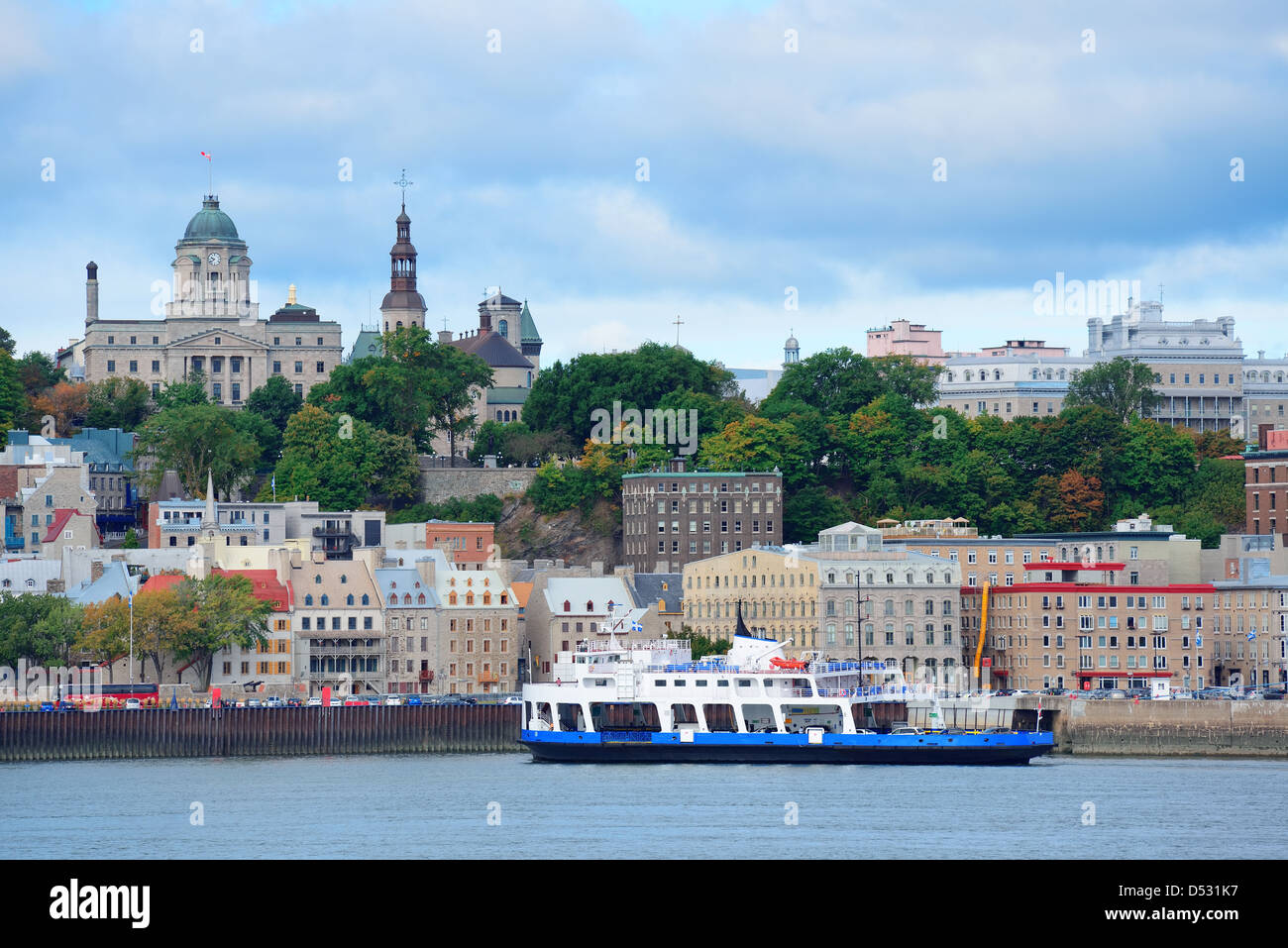 Quebec City skyline over river with blue sky and cloud Stock Photo - Alamy