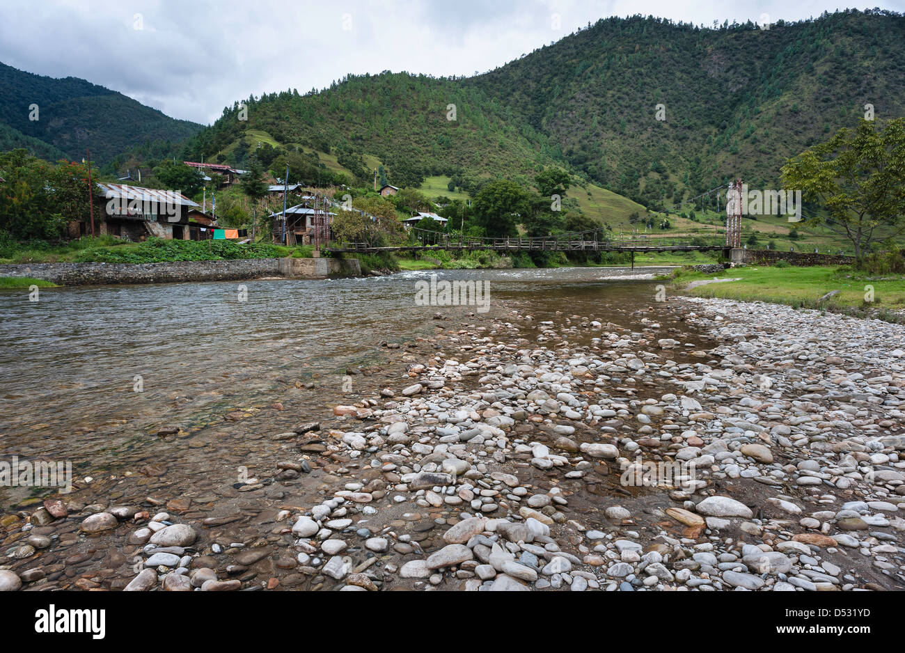 Sangti river with view of suspension bridge and part of Sangti village ...