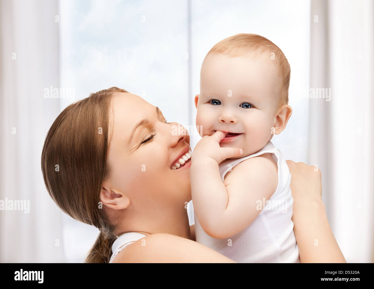 happy mother with adorable baby Stock Photo - Alamy