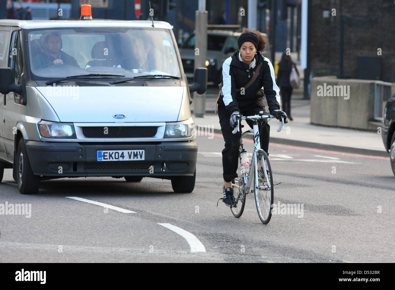 Female commuter cyclist hi-res stock photography and images - Alamy