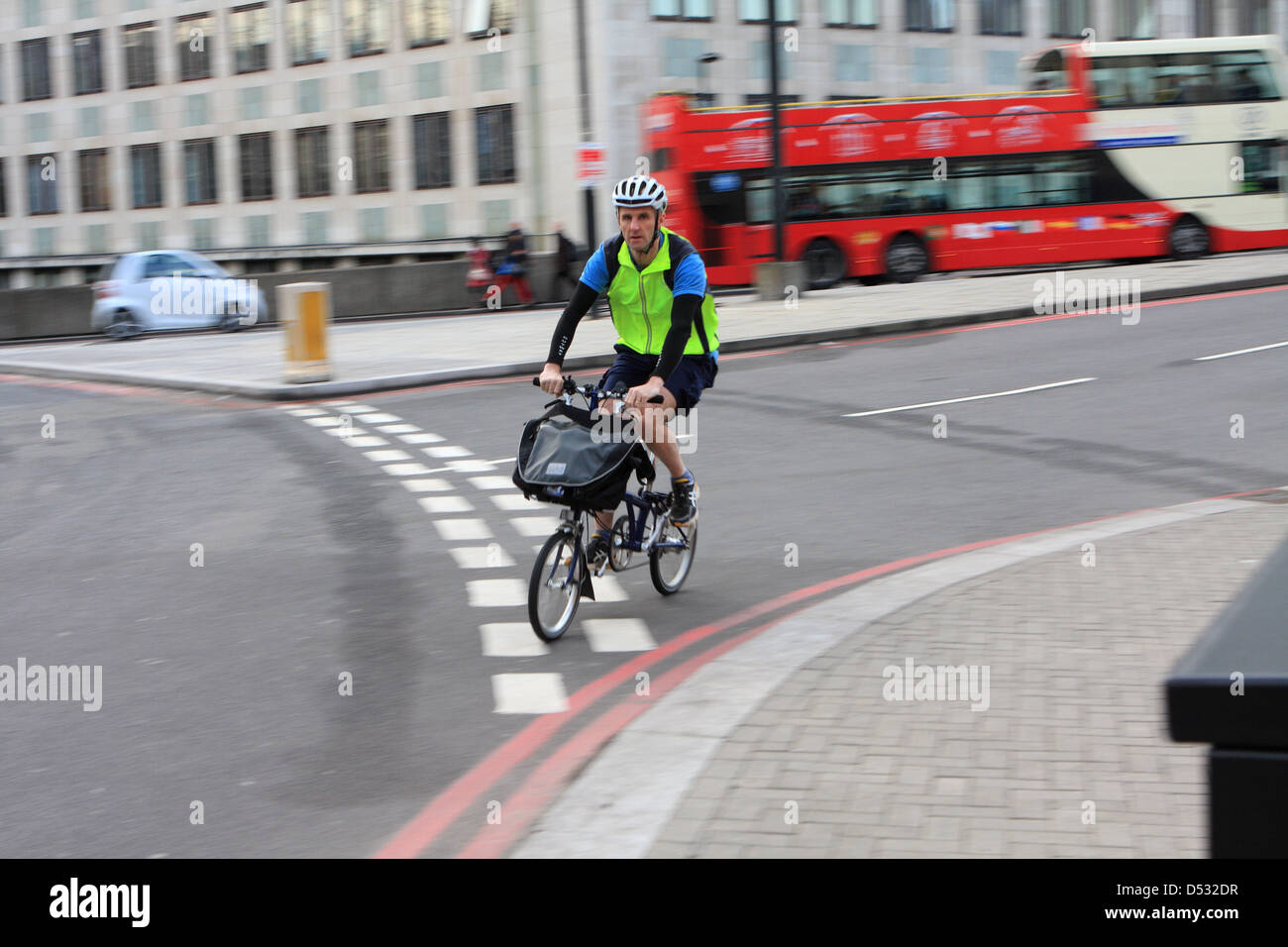 cyclist entering a roundabout in London, England Stock Photo - Alamy