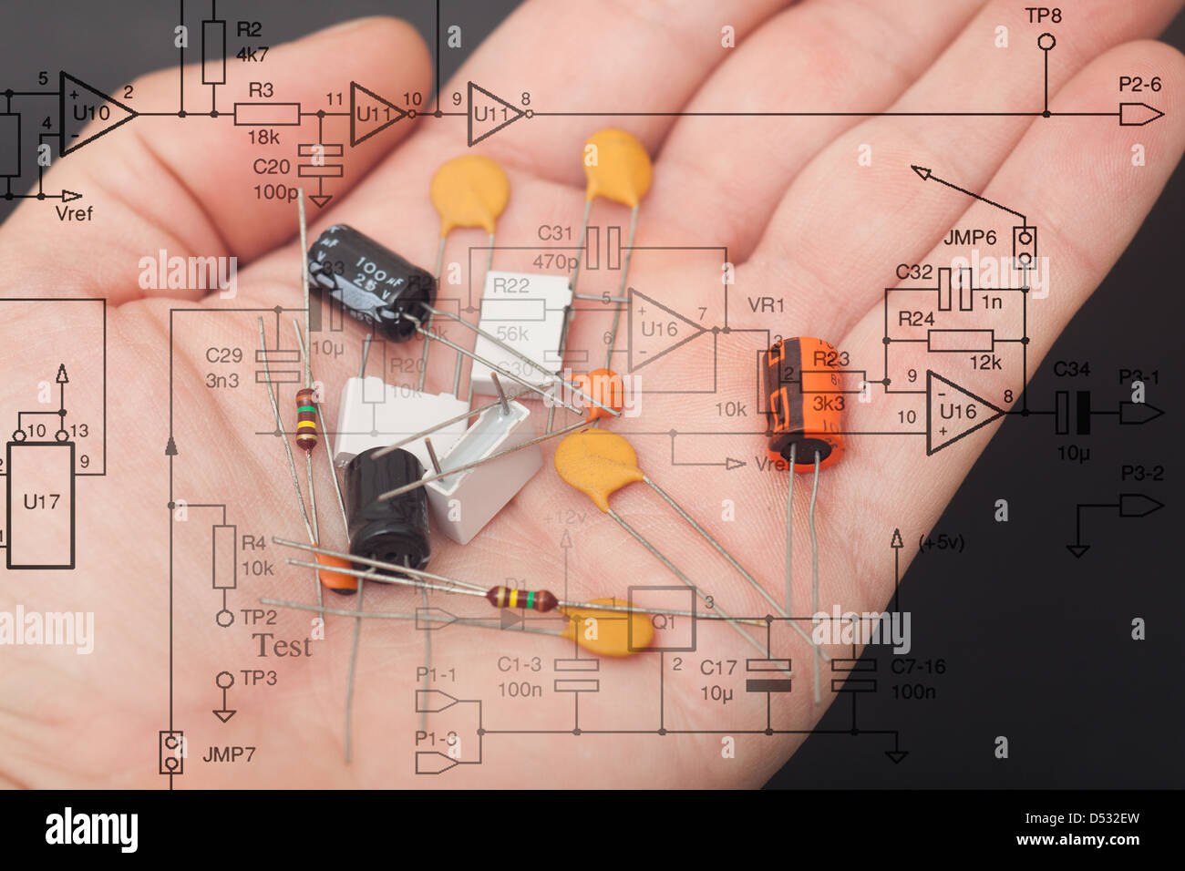 Electronic components in one hand Stock Photo - Alamy