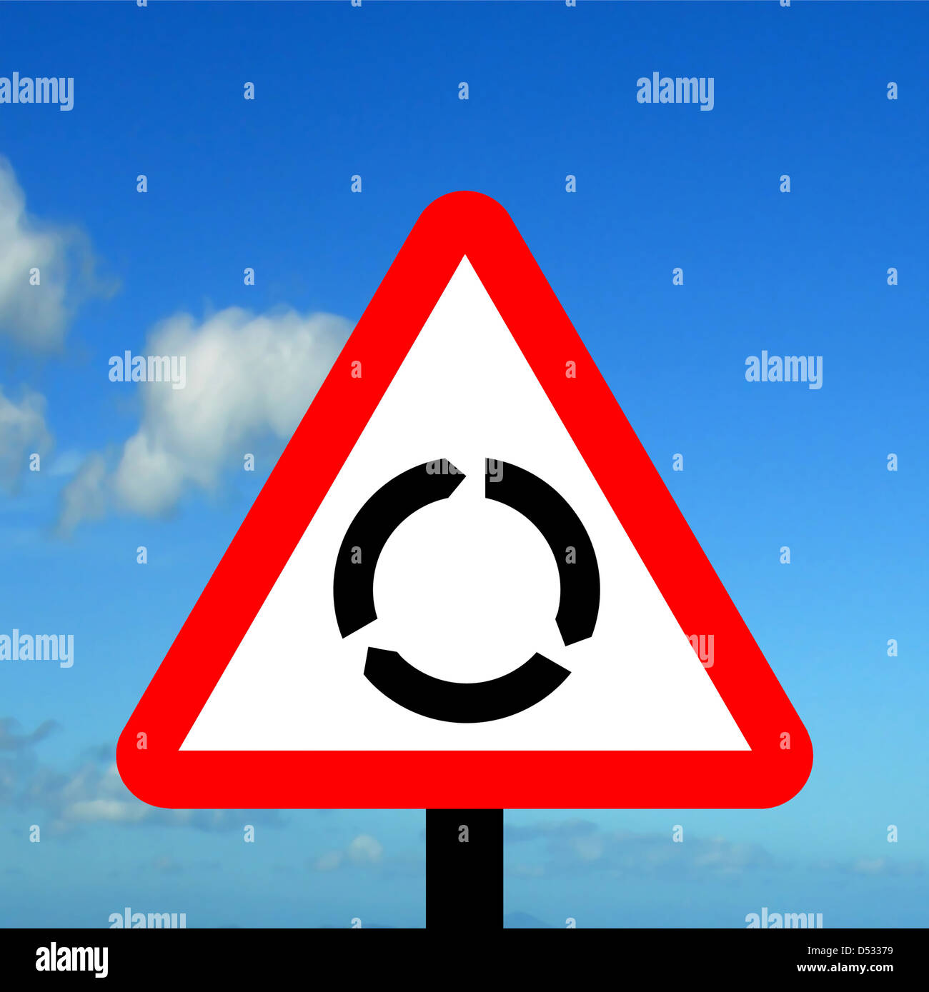 Warning triangle roundabout road traffic sign Stock Photo - Alamy
