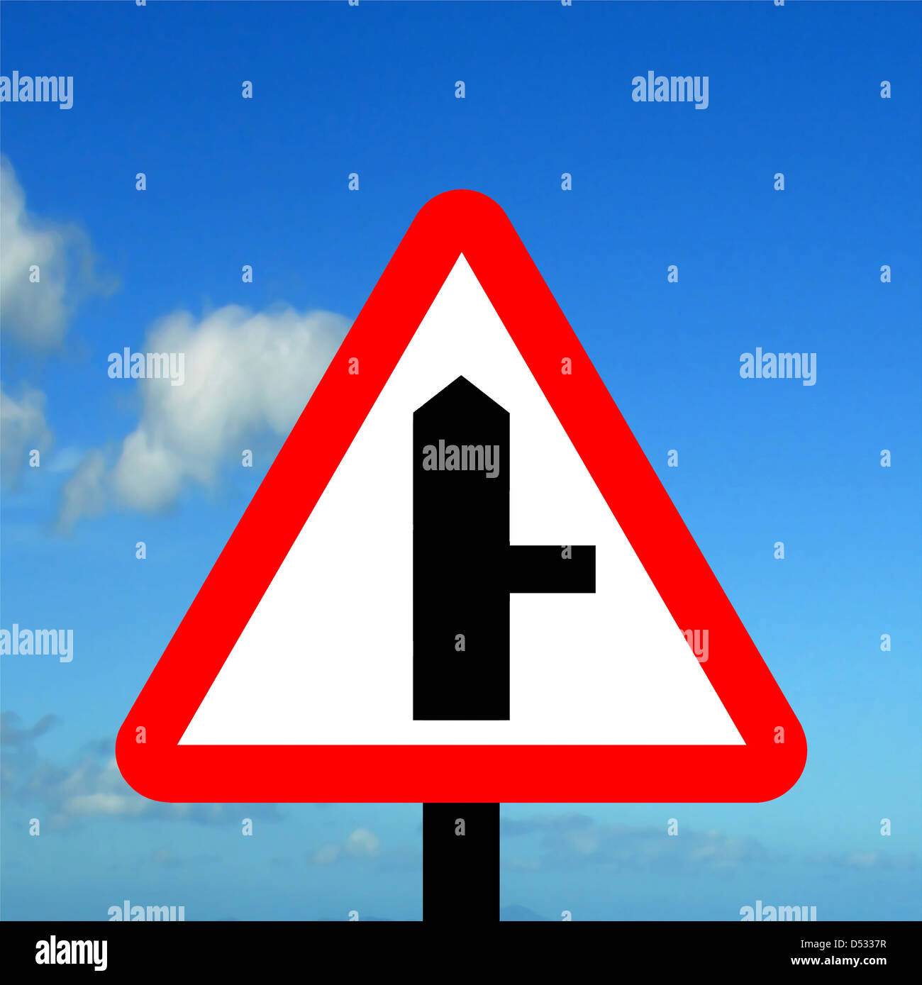 Warning triangle side road traffic sign Stock Photo - Alamy