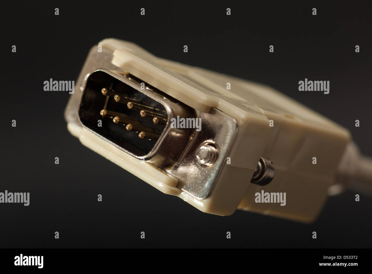 Computer plug on black background Stock Photo - Alamy