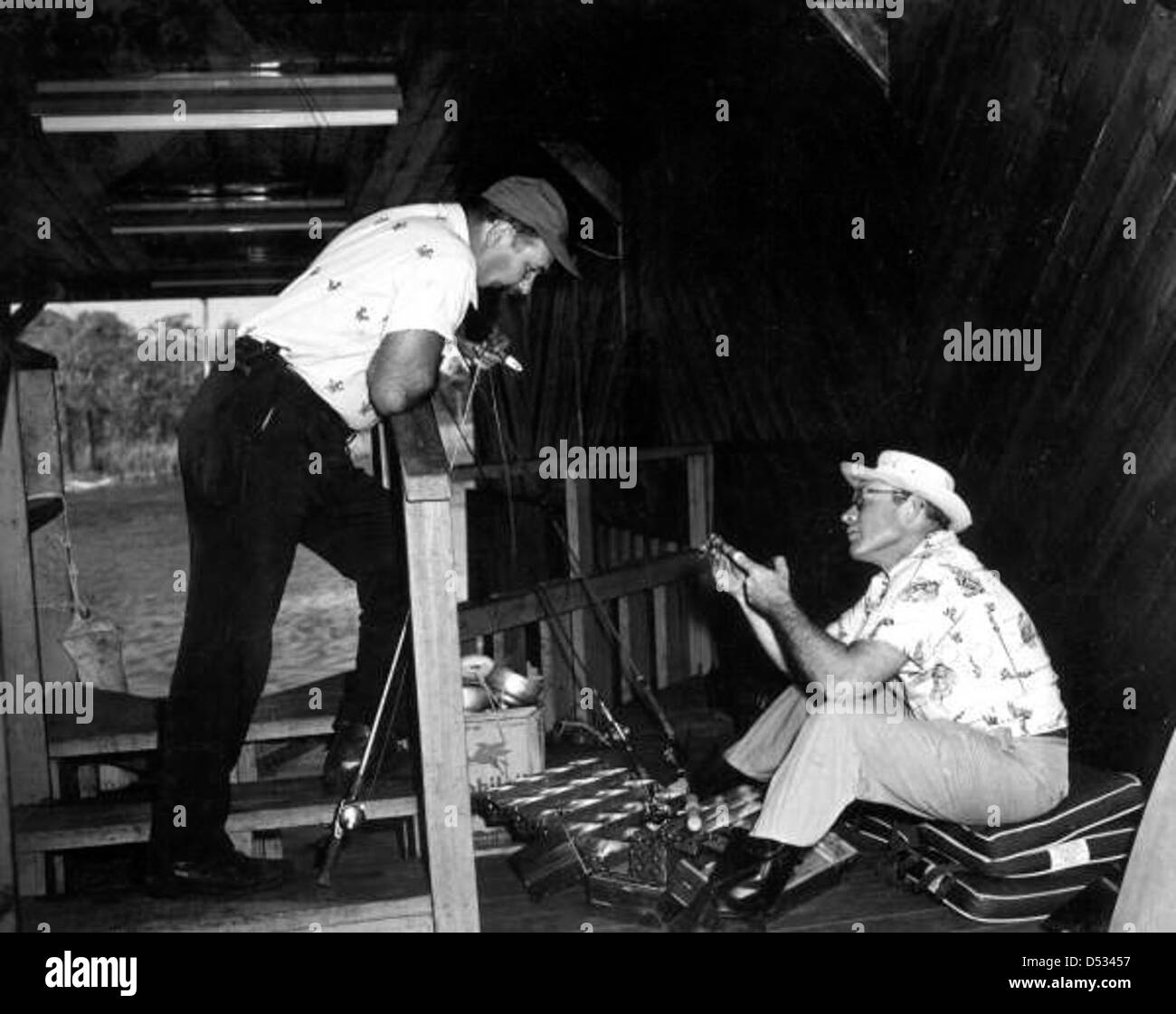 Al Zaebst and Howe Sadler discuss tackle during a fishing contest ...