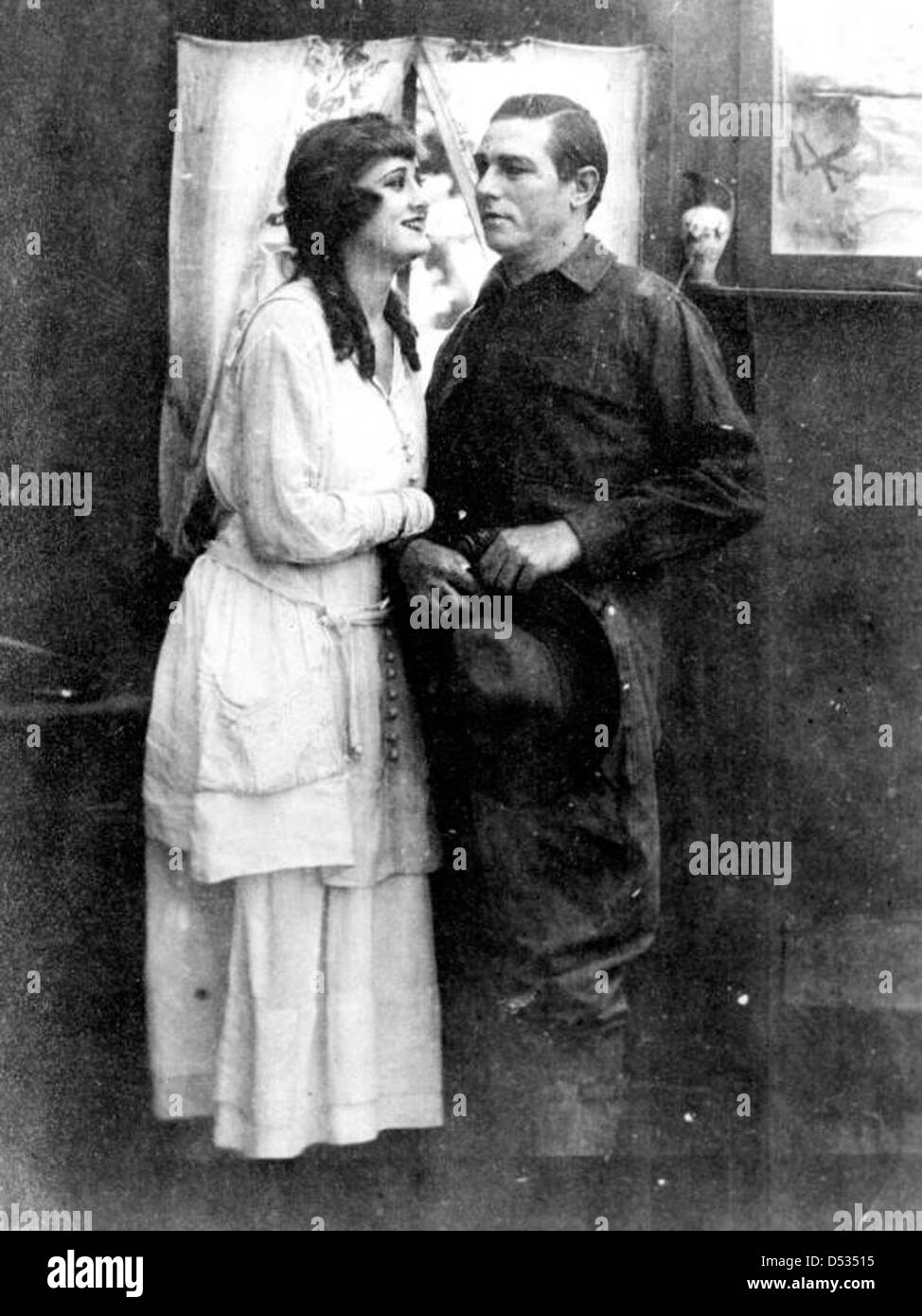 Ethel Burton of the Vim Comedy Company is pictured in 1916, standing ...