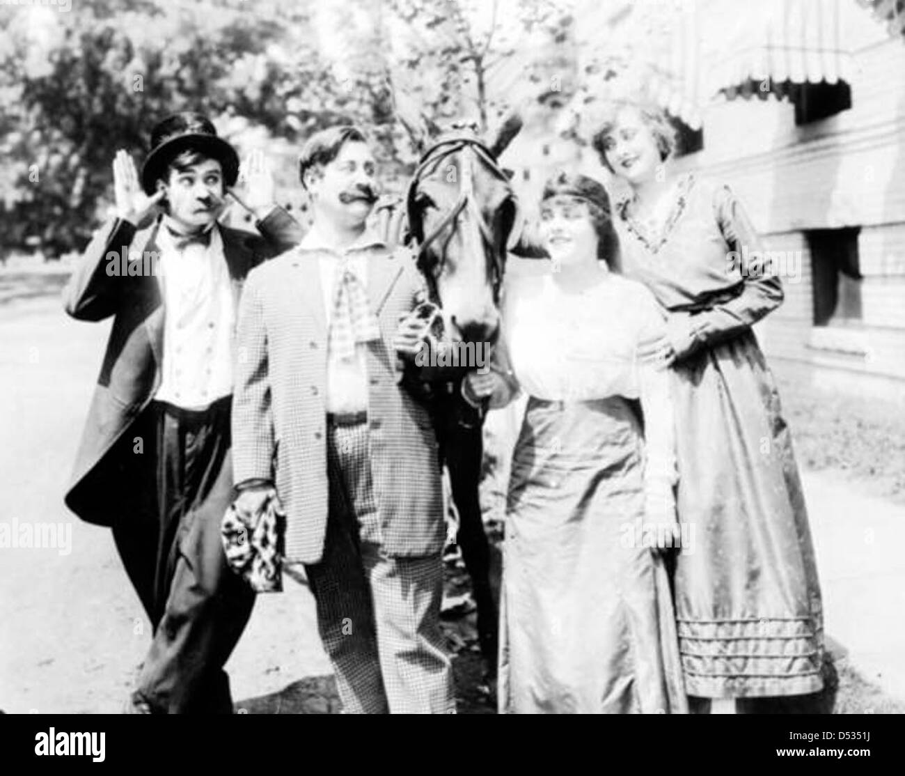 A scene from a 1916 motion picture featuring actors Bobby Burns and ...