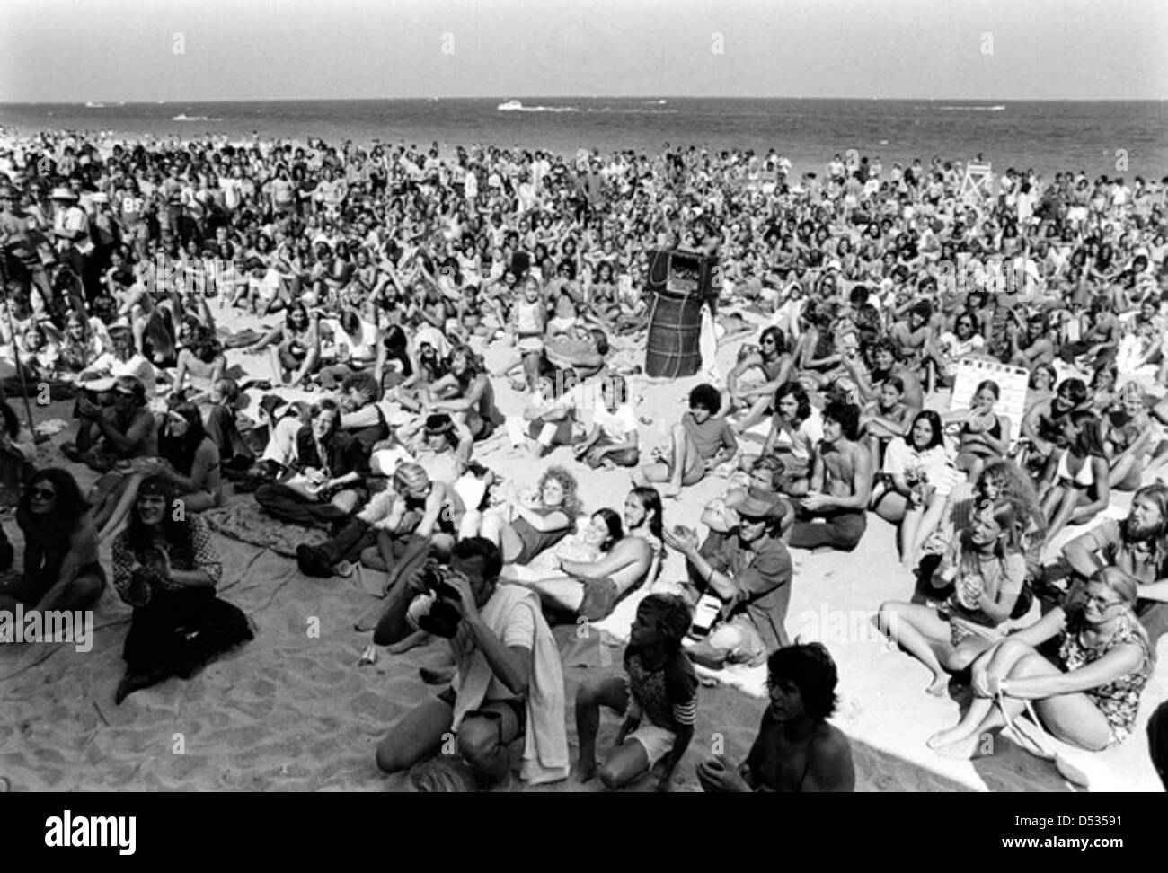 Crowd on the beach enjoying entertainment offered by the Department of ...