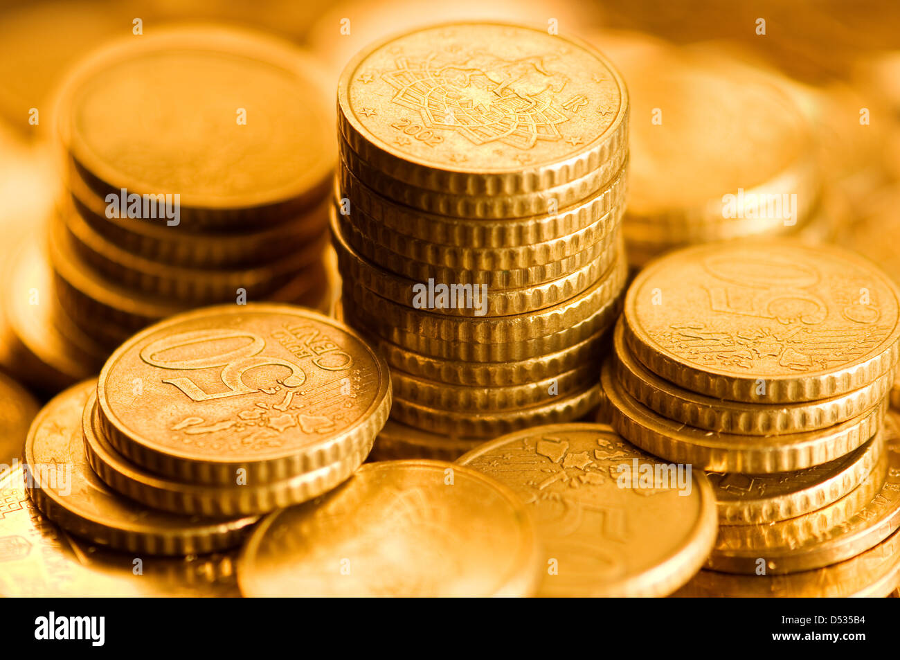 gold identical coin close up Stock Photo - Alamy