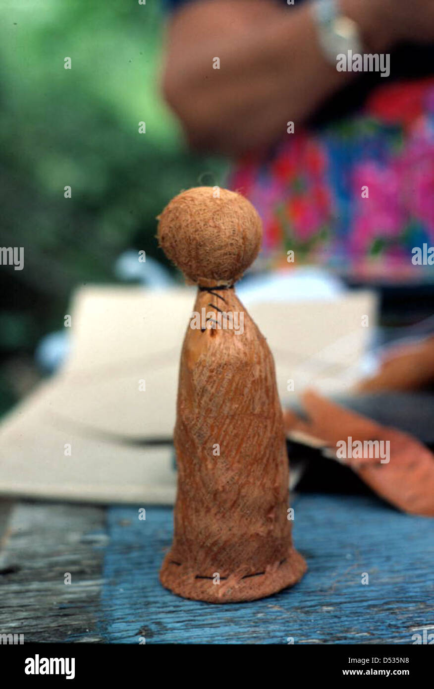 Mary Billie, a Seminole artist, is shown making a Seminole doll at the ...