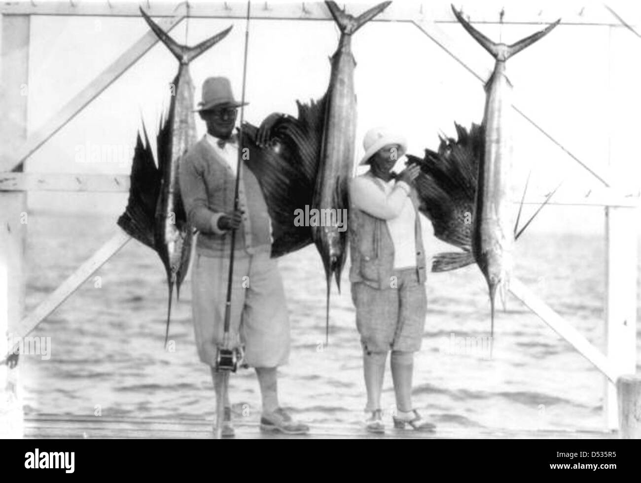 A couple proudly poses in Key West, Florida, with their catch of ...