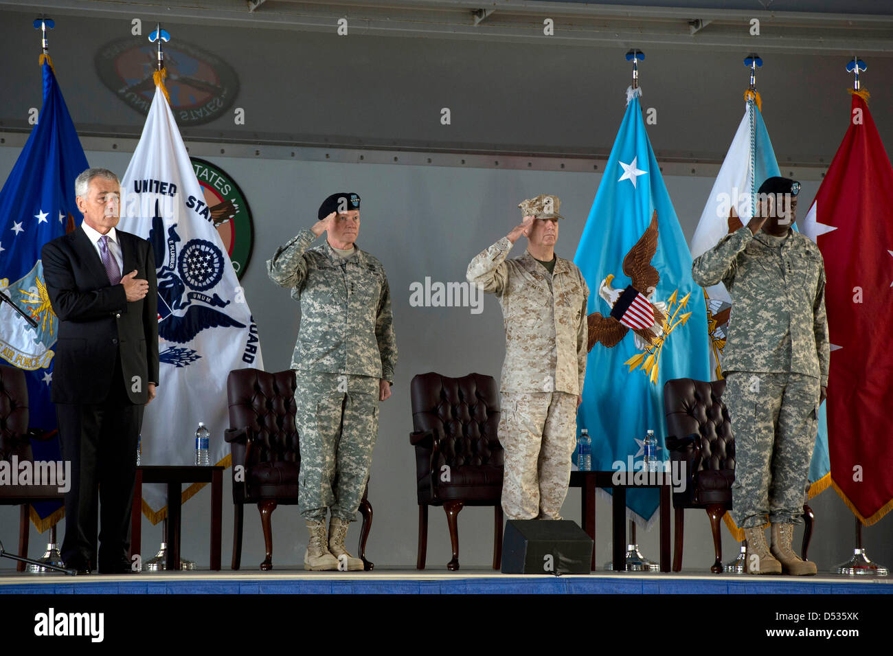 US Secretary of Defense Chuck Hagel stands with General Martin Dempsey ...