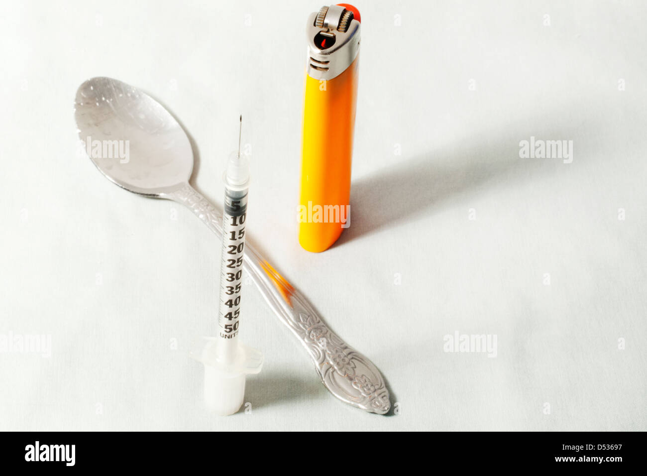 A Syringe, Spoon and Lighter Stock Photo - Alamy