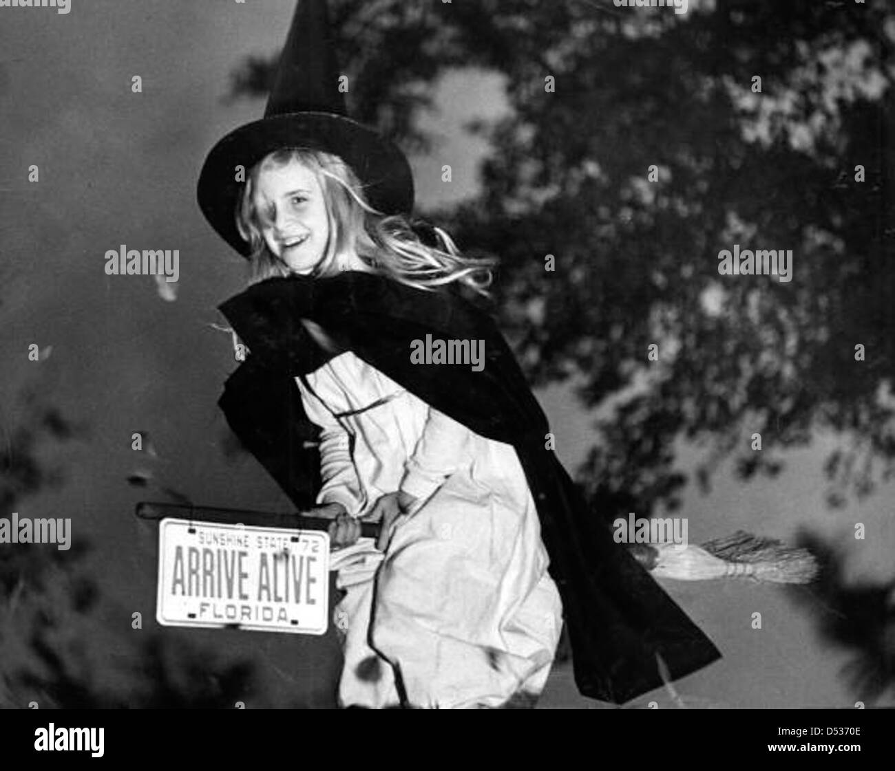 Leslie Dughi is pictured dressed as a witch for Halloween in ...