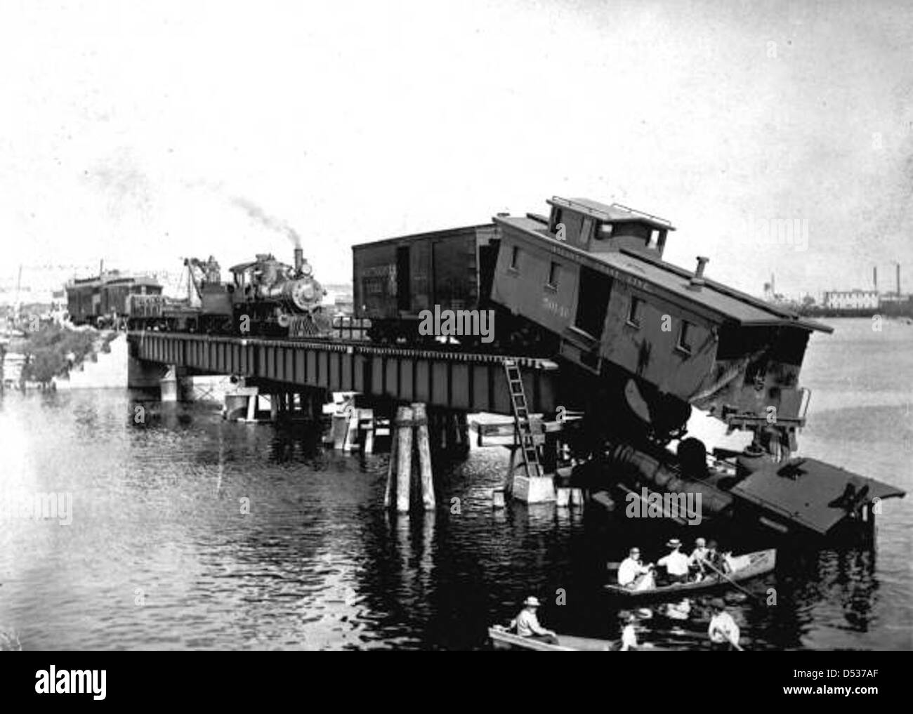 A train wreck on a bridge in Tampa is depicted, highlighting the ...