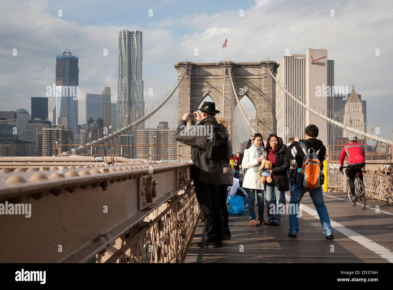 New York City, United States, people on the Brooklyn Bridge Stock Photo ...