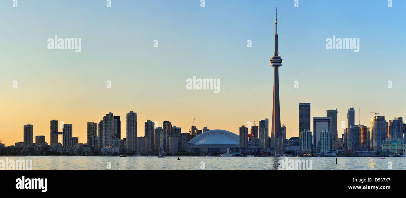 Toronto sunset over lake panorama with urban skyline Stock Photo - Alamy